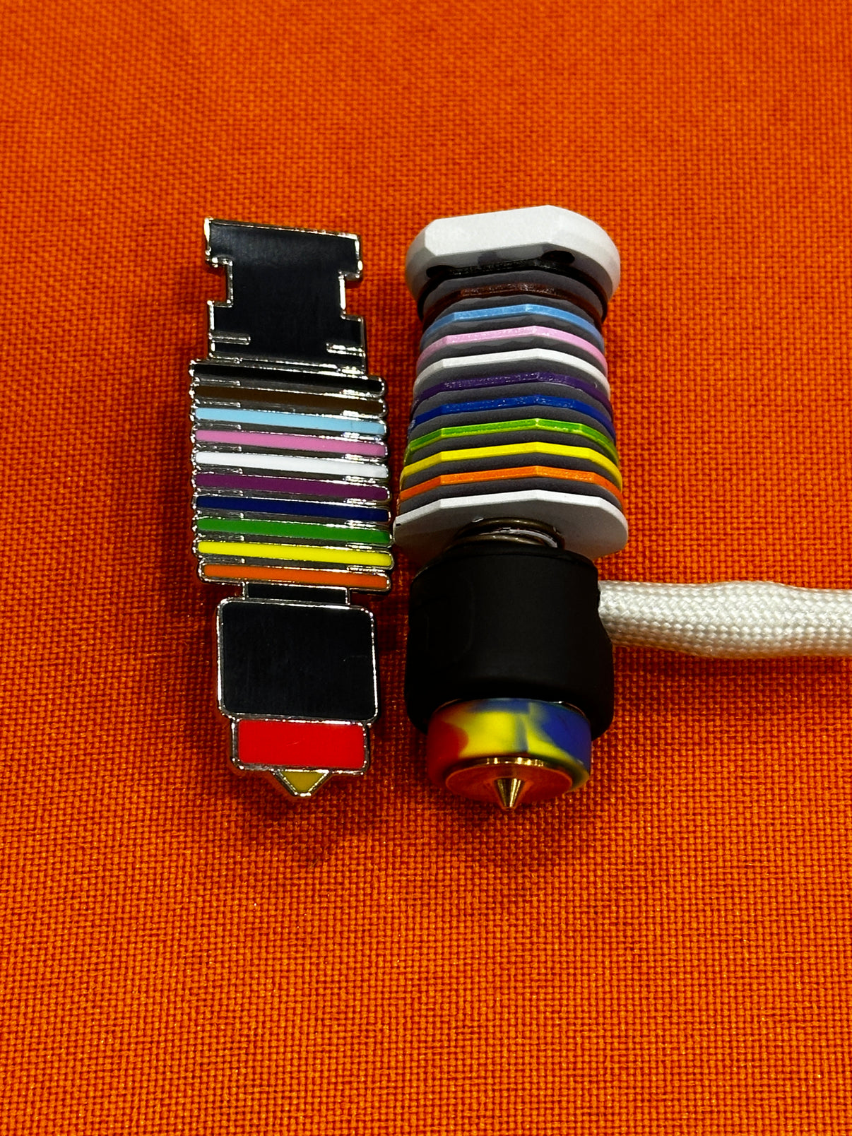 REVO Pride Pin – Cocoa Press